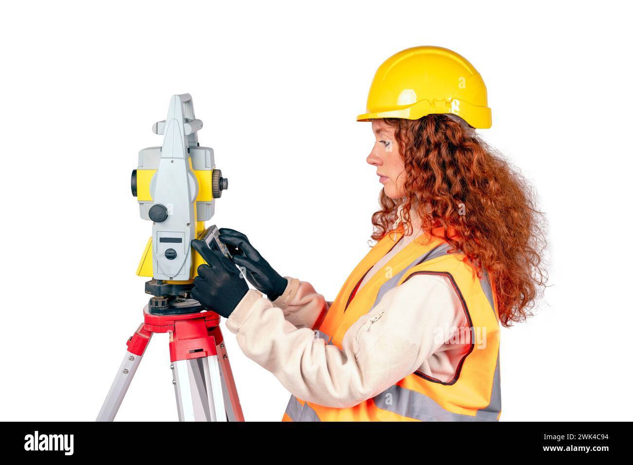 Construction site engineer woman in safety equipment working with ...