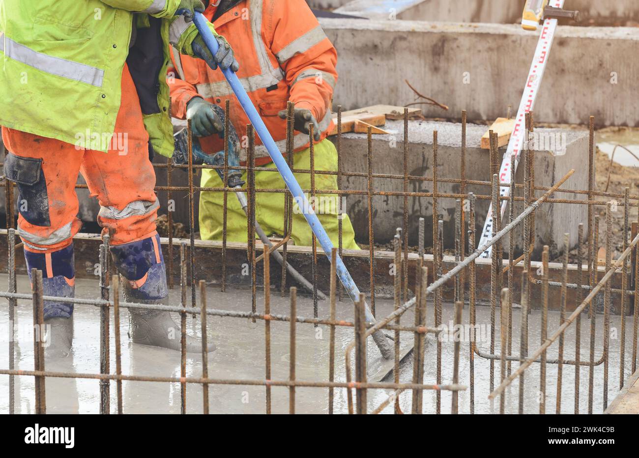 Concrete cast-in-place work. Builder level wet concrete. Concrete works ...
