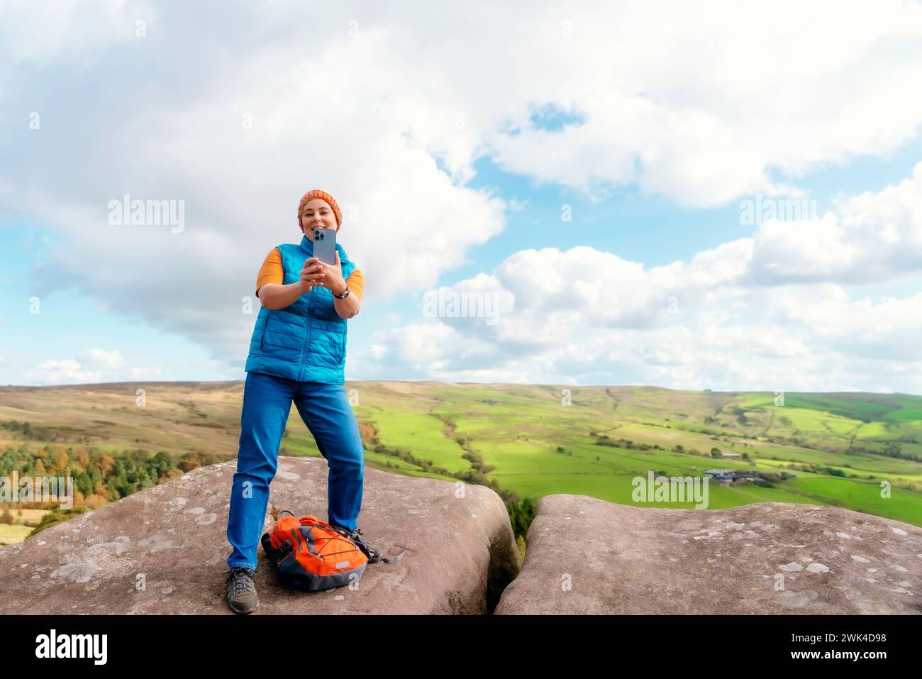 Happy woman tourist hiking and exploring new places Stock Photo - Alamy