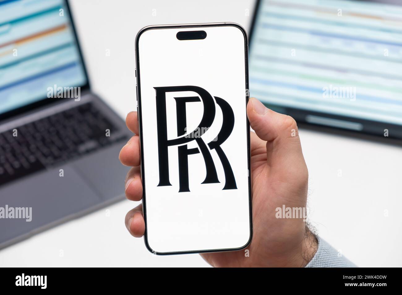 PRAGUE, CZECHIA - FEBRUARY, 2024: Rolls Royce automobile logo on the screen of smartphone in ...
