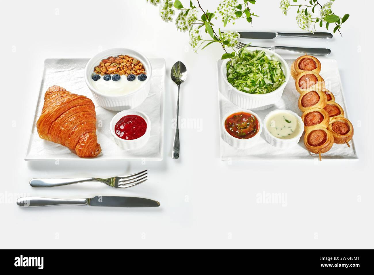 Elegant breakfast layout with croissant and hot bites Stock Photo - Alamy