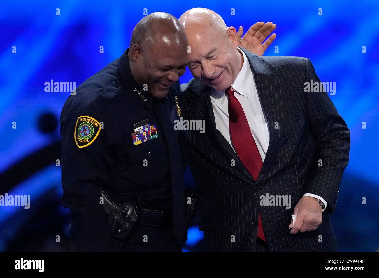 Houston Mayor John Whitmire, right, is embraced by Houston Police Chief ...