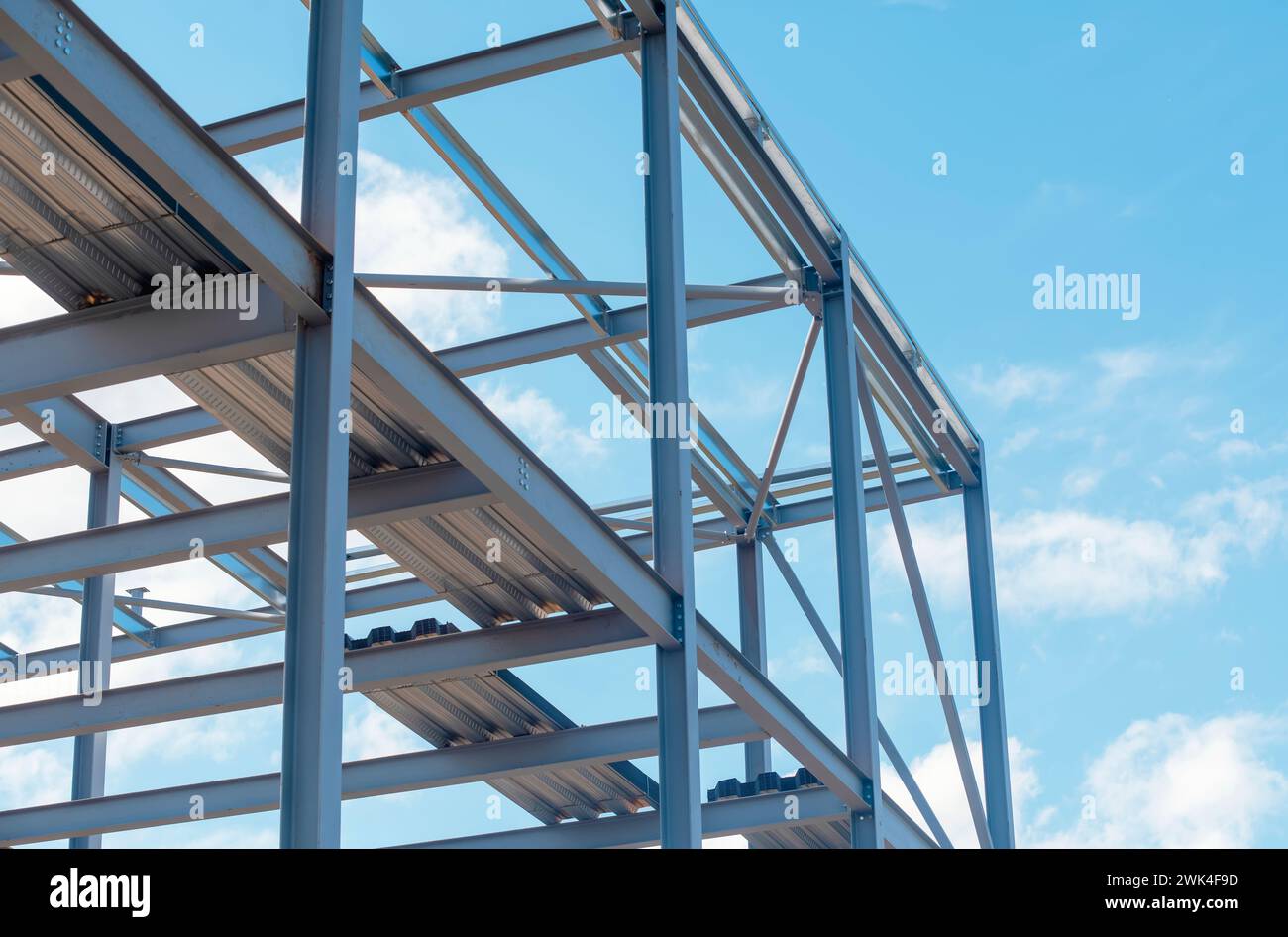 Steel frame commercial building under construction Stock Photo - Alamy