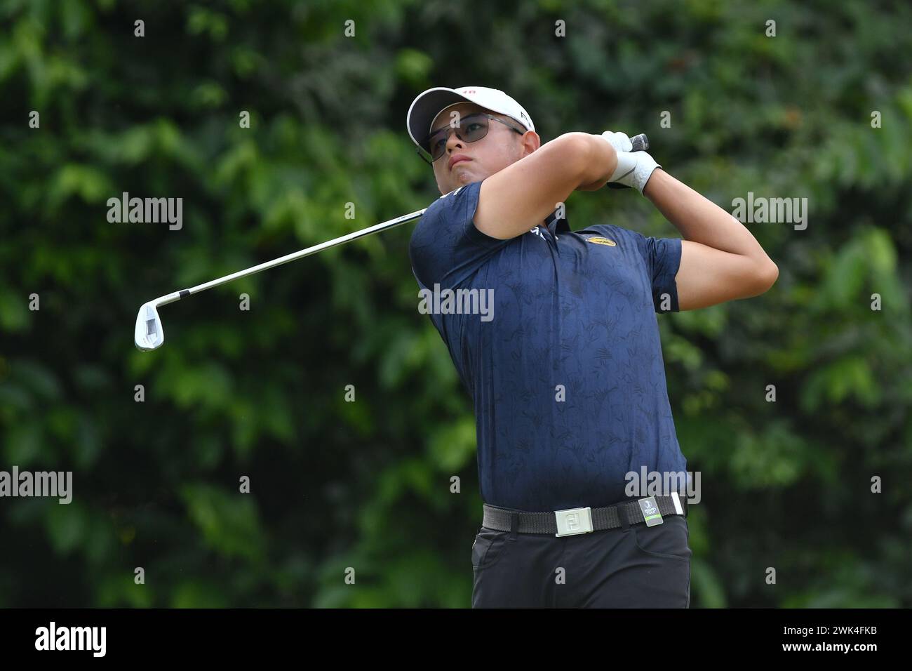SERDANG - FEB 18: Ervin Chang of Malaysia shot his tee at the 2nd tee ...
