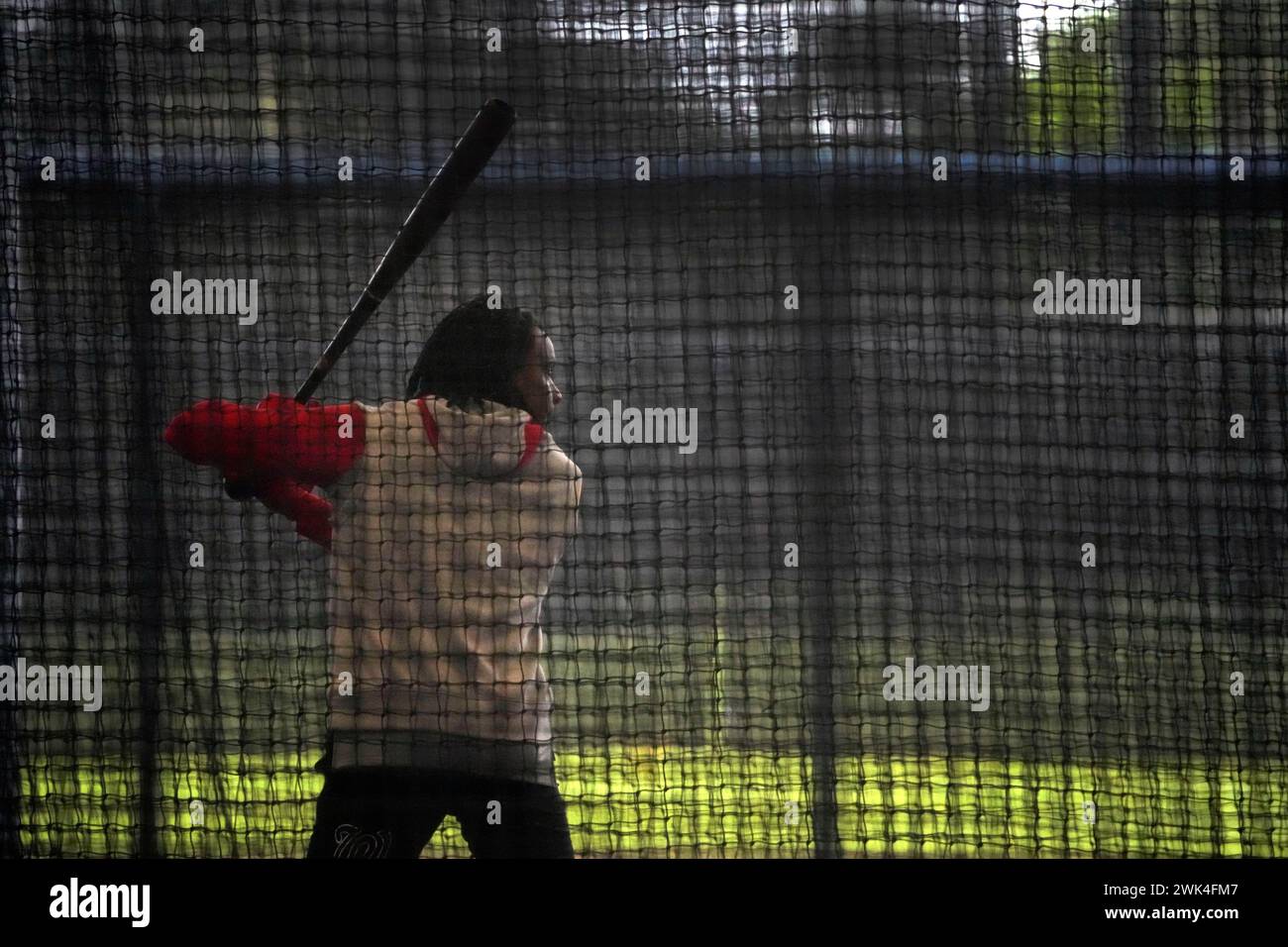 Washington Nationals' CJ Abrams works in the batting cage during a ...