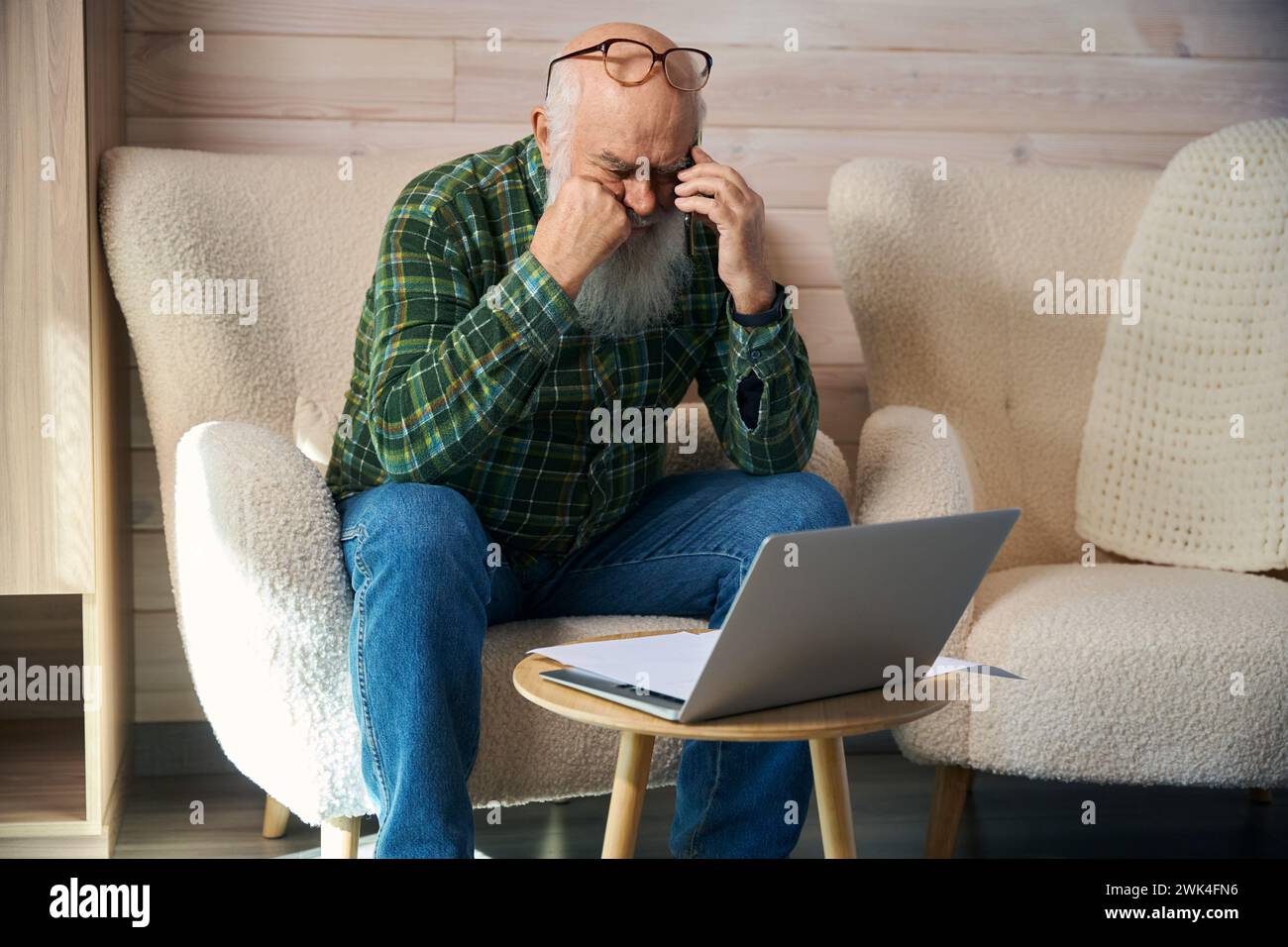 Elderly man works documents hi-res stock photography and images - Alamy