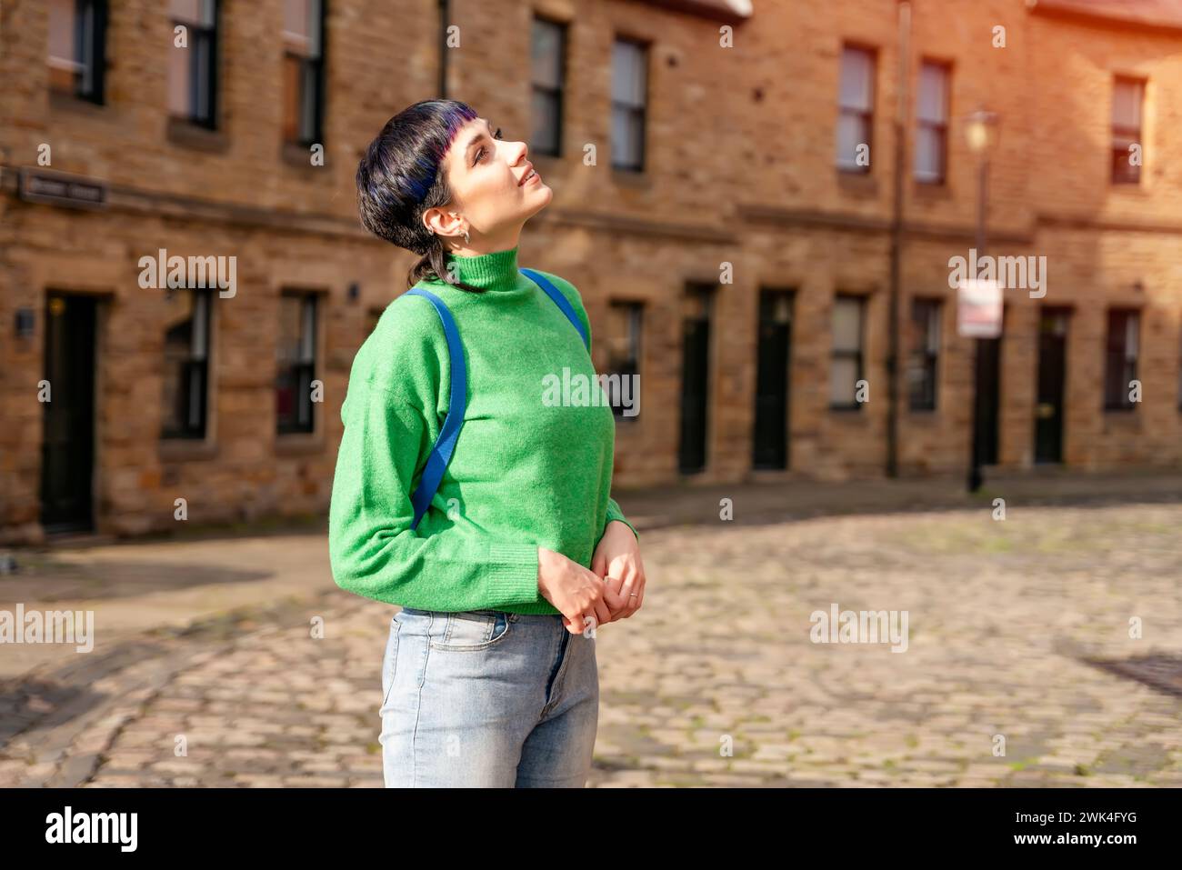 Portrait of a beautiful happy woman tourist travelling around world and ...