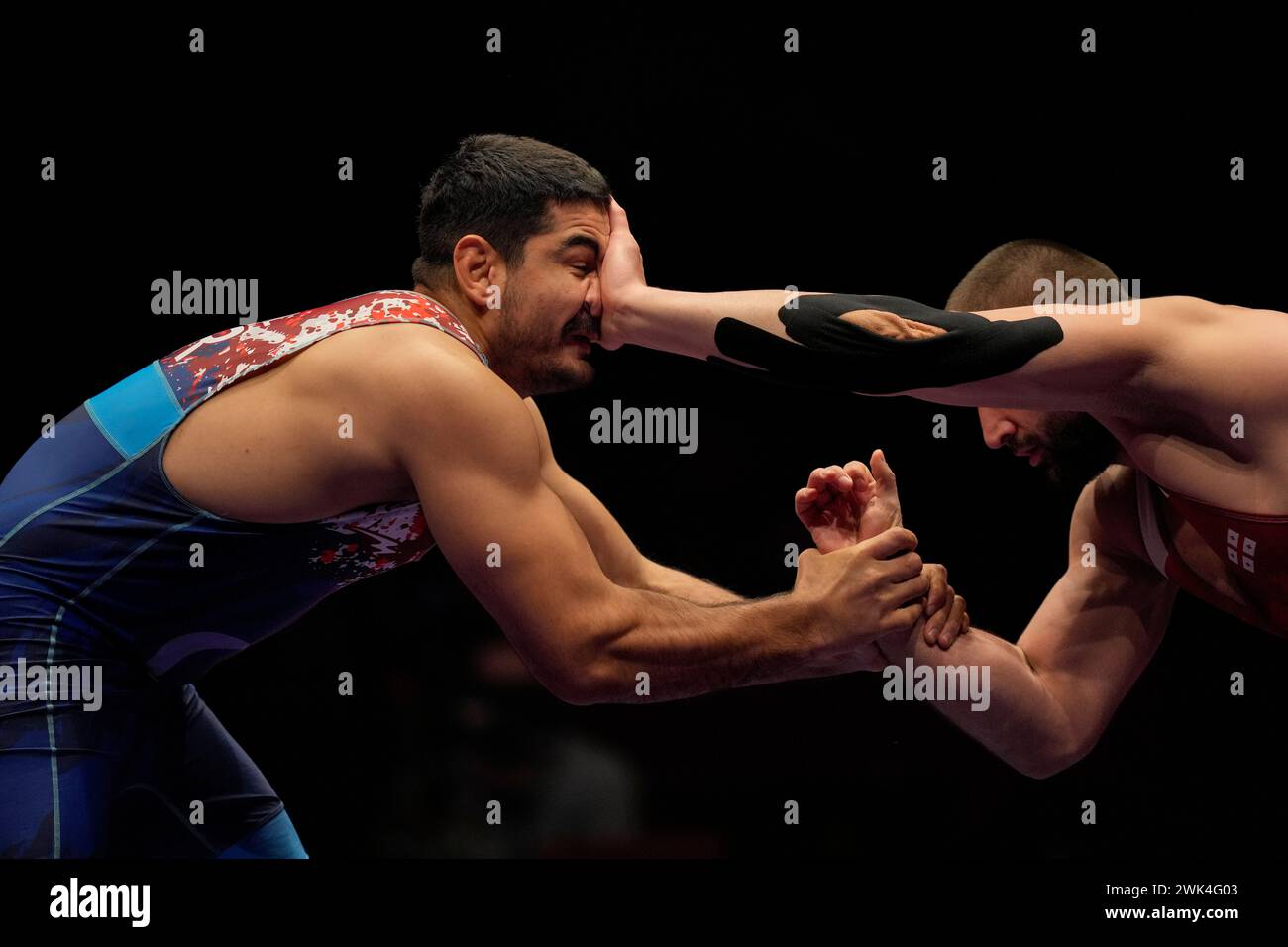 Turkey's Taha Akgul, left, competes with Georgia's Geno Petriashvili in ...