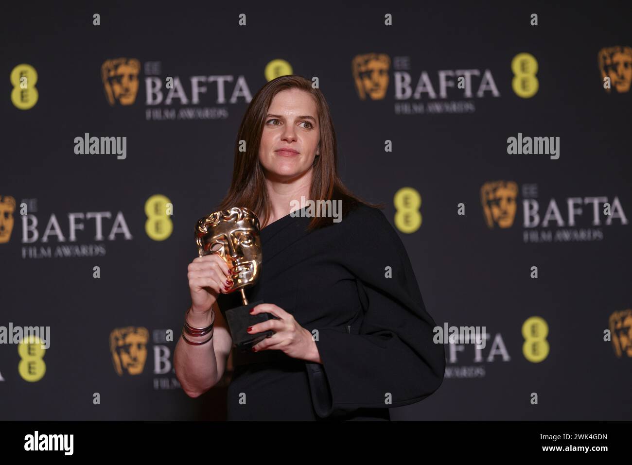 Jennifer Lame, winner of the editing award for 'Oppenheimer', poses for ...