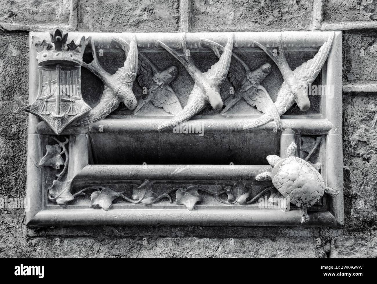 Stone mail slot in a building wall in Barcelona. Beautiful urban ...