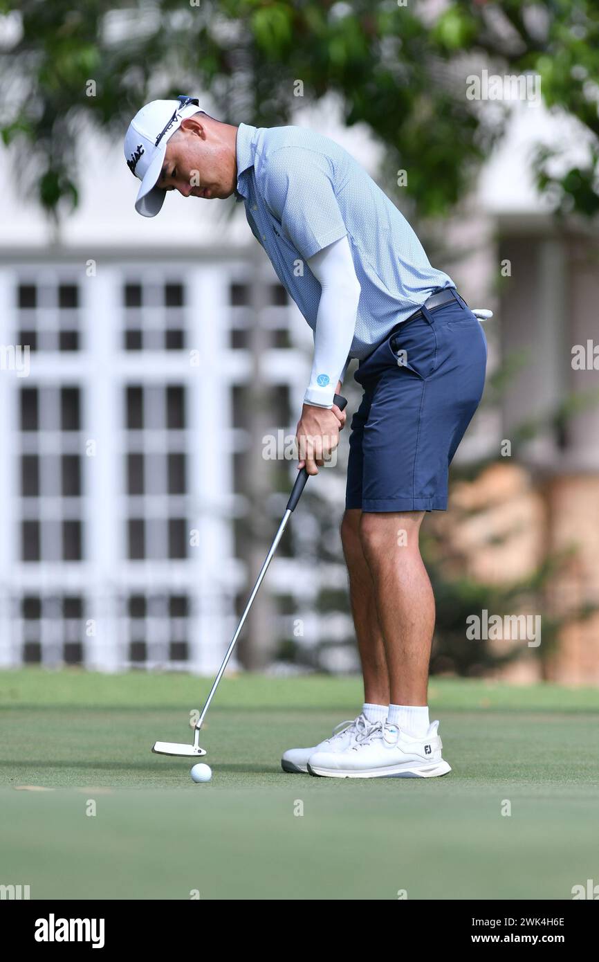 SERDANG - FEB 18: Kevin Yuan of Australia make a putt at 3rd hole ...