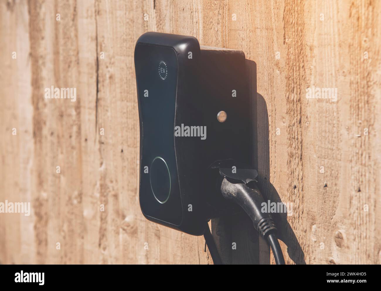 Electric vehicle domestic charging point installed outside of the house ...