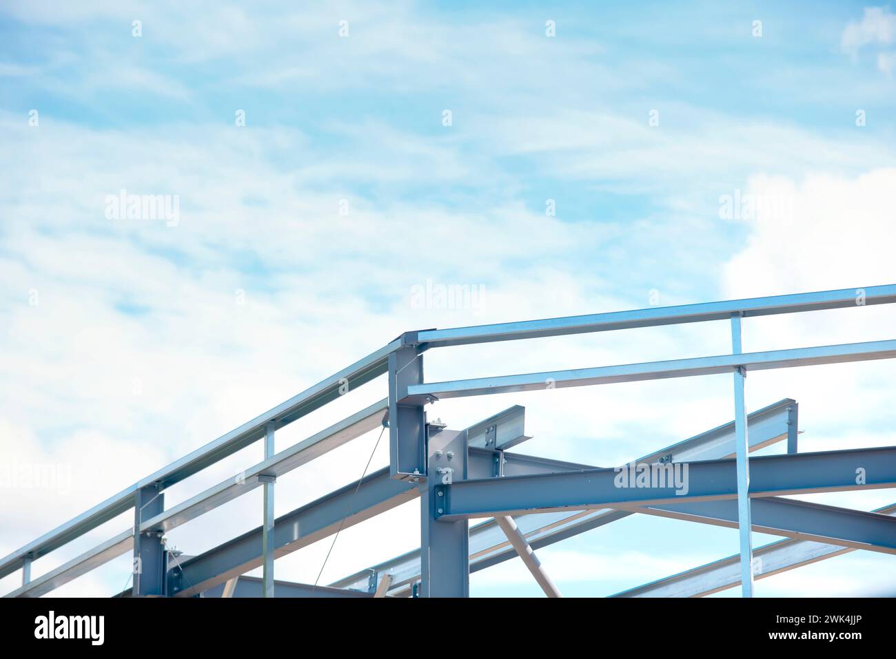 Steel frame commercial building under construction Stock Photo - Alamy