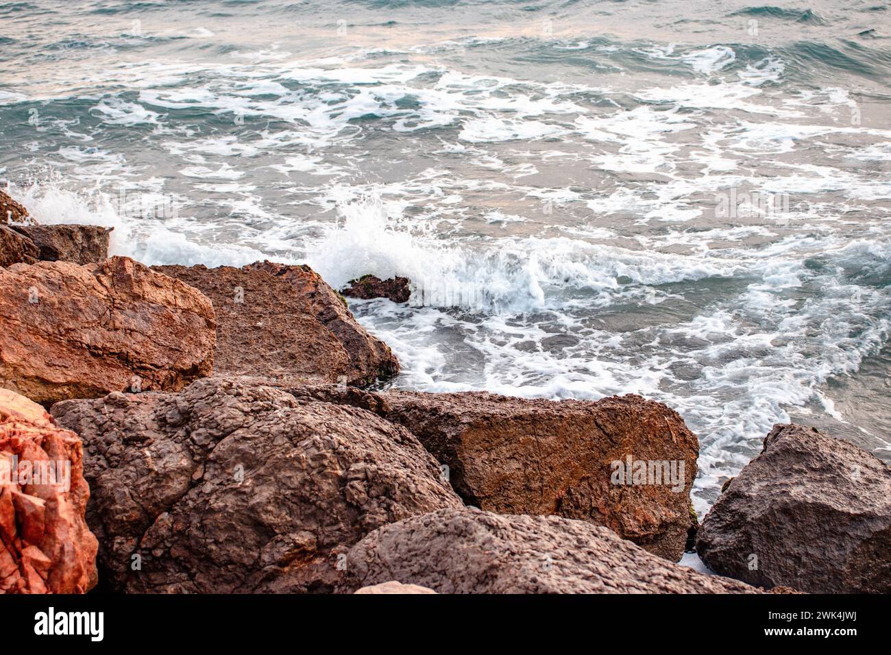 Winter sea with stones on the beach concept photo. Underwater rock ...