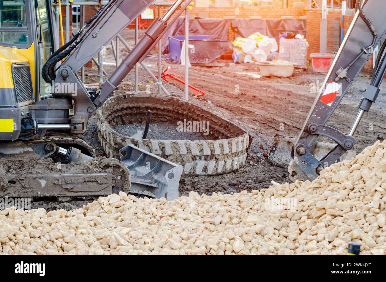 Broken excavator without track on building site awaiting repair Stock ...
