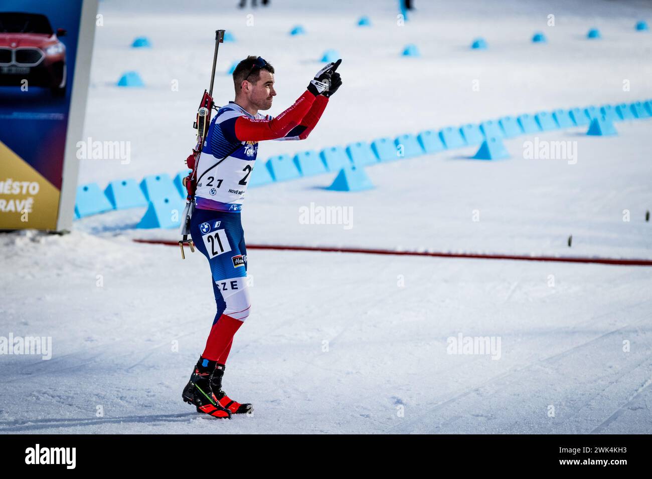Czech Michal Krcmar greets fans after the Men's mass start race - 15 km ...