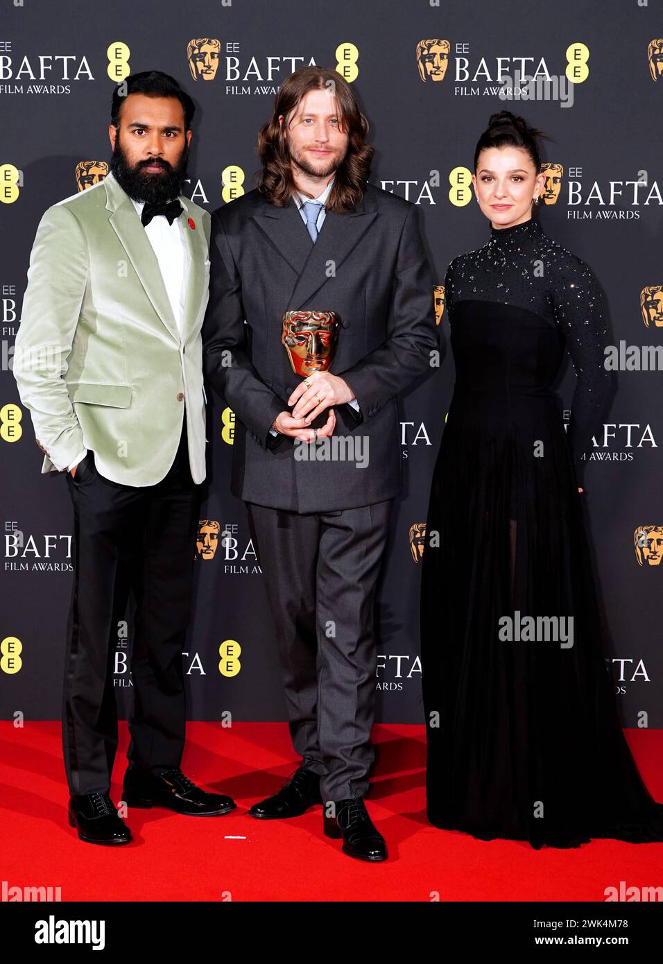 Ludwig Goransson (centre) in the press room with award presenters ...
