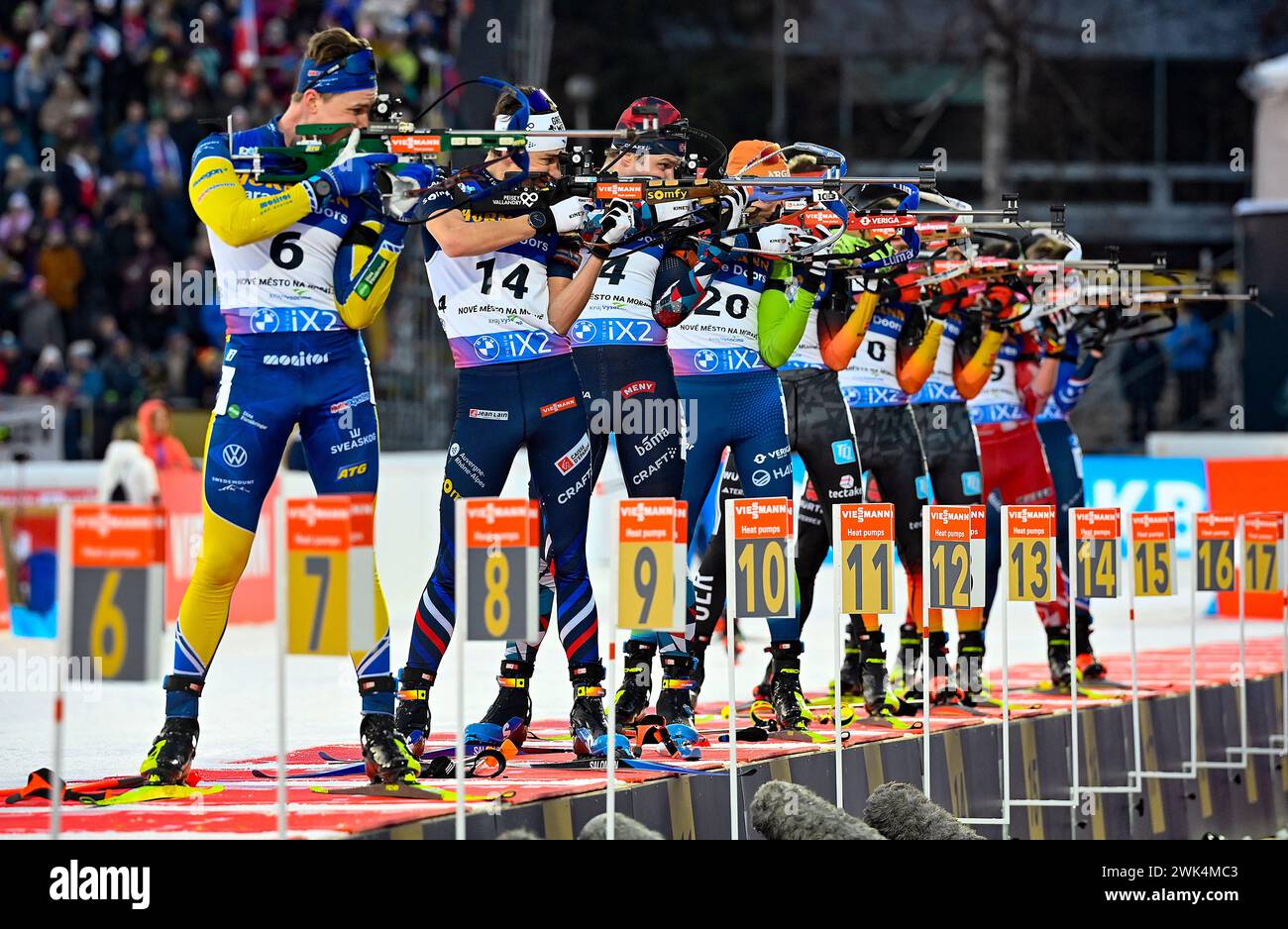 Biathletes in action during the Men's mass start race - 15 km during ...