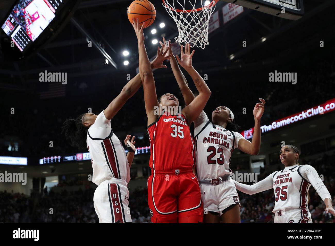 Georgia forward Javyn Nicholson (35) shoots over South Carolina forward ...