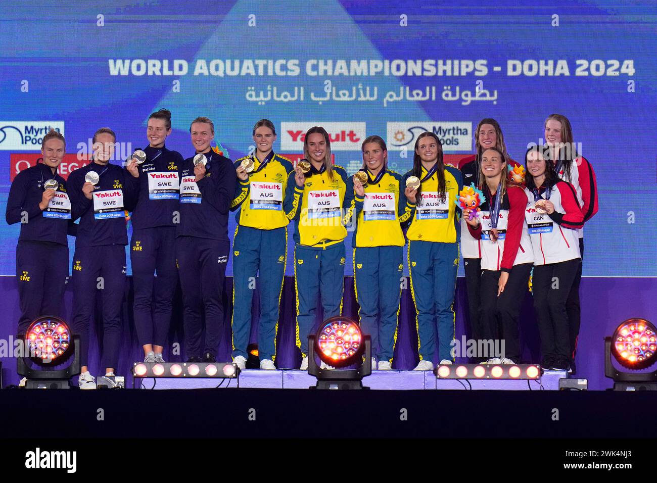 Silver medalists Team Sweden, gold medalists Team Australia and bronze medalists Team Canada ...