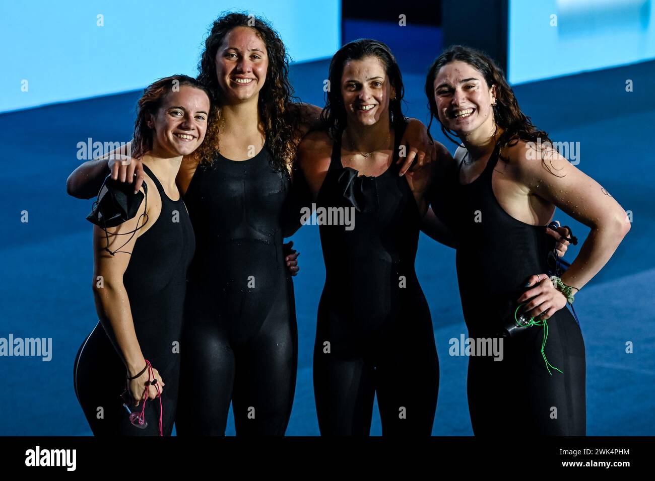 Doha, Qatar. 18th Feb, 2024. Athletes of team Italy react after ...