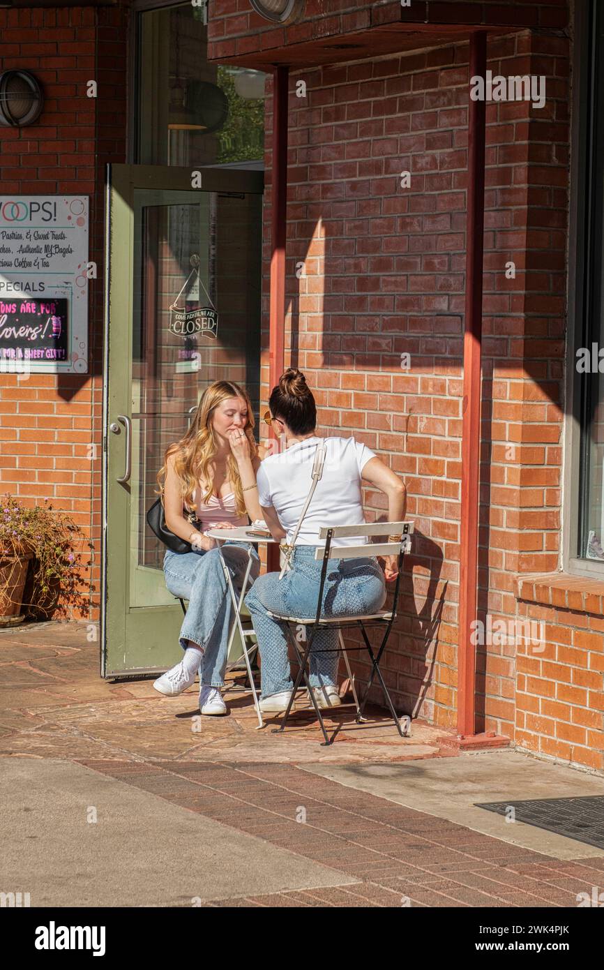 People sitting outside cafe along hi-res stock photography and images ...