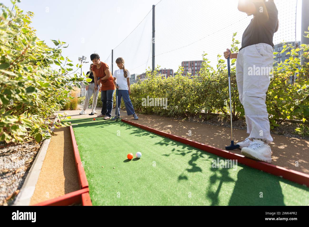 Cute boy playing golf hi-res stock photography and images - Alamy