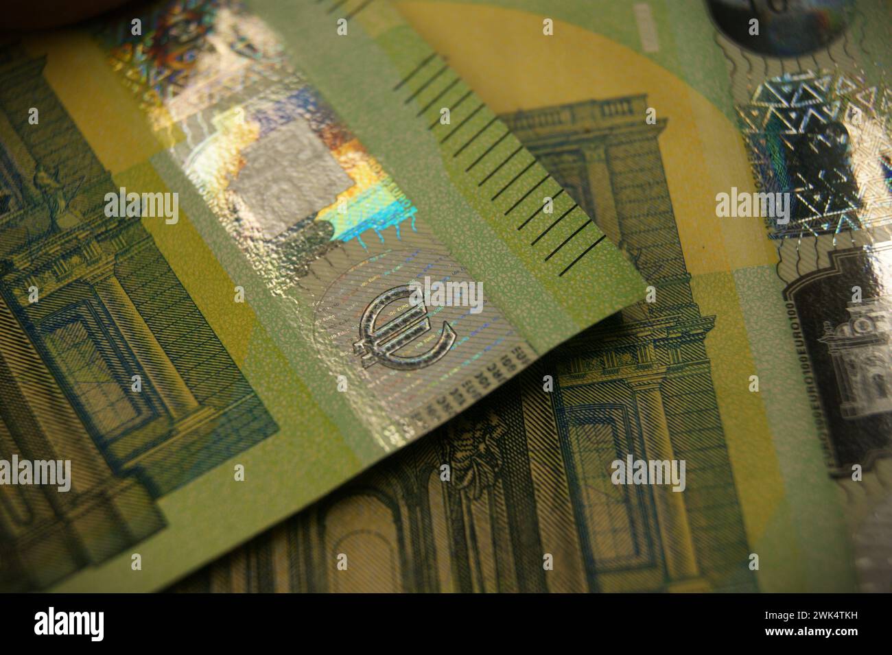A fragment of a 100 euro banknotes with a hologram. Euro symbol Stock ...