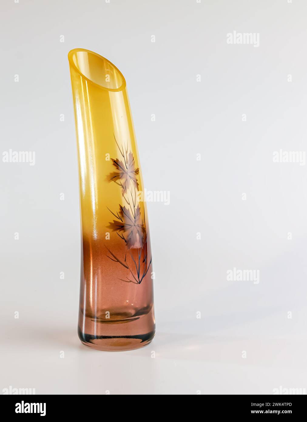 Empty crystal vase on white background. The vase was made in the mid ...