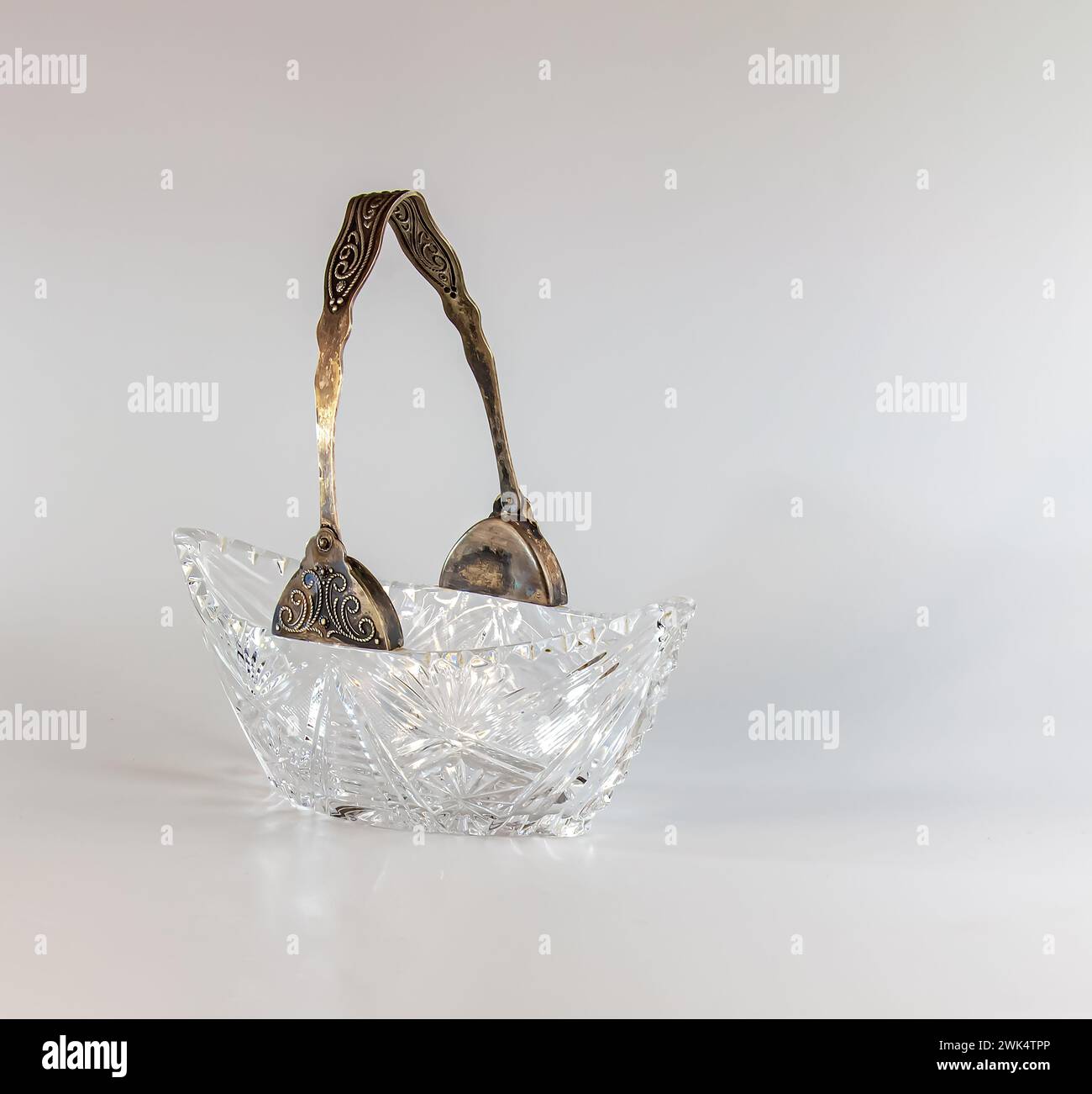 Empty crystal candy bowl on a white background. The vase was made in ...