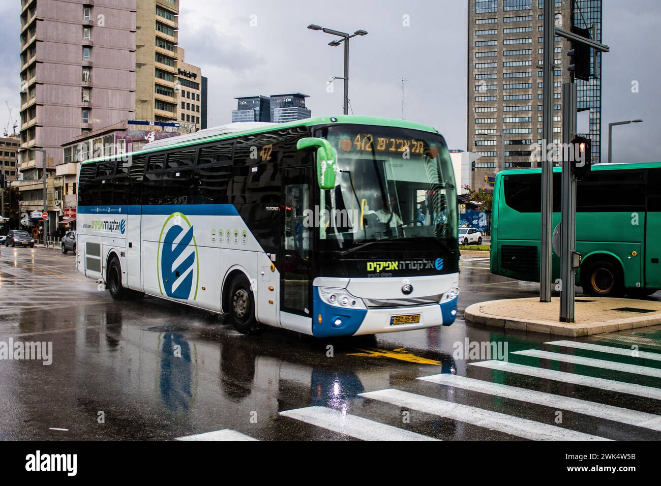 Tel Aviv, Israel, February 18, 2024 Local israeli bus under the rain ...
