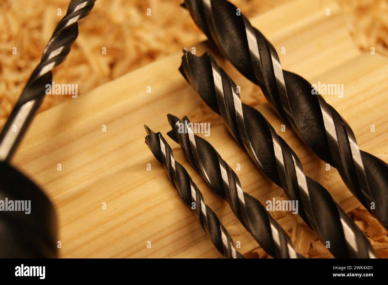 New drill bits of different sizes for drilling wood Stock Photo - Alamy