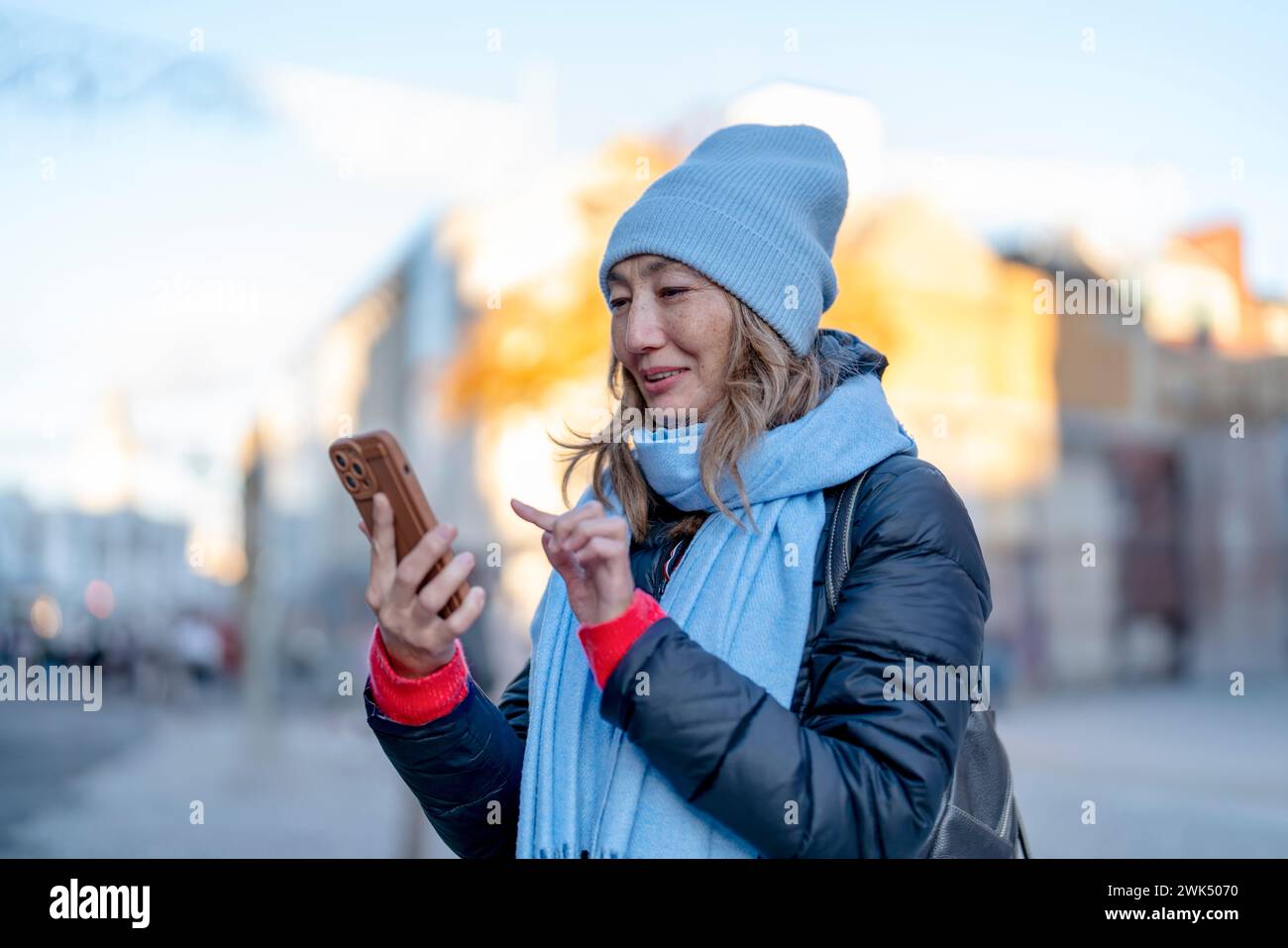 a beautiful happy asian woman tourist travelling around the world and ...