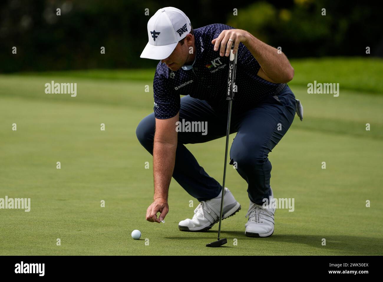 Luke List looks at his ball on the sixth green during the final round ...