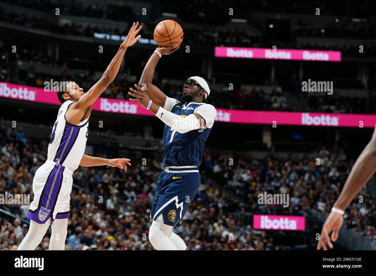 Denver Nuggets guard Reggie Jackson (7) shoots over Sacramento Kings ...