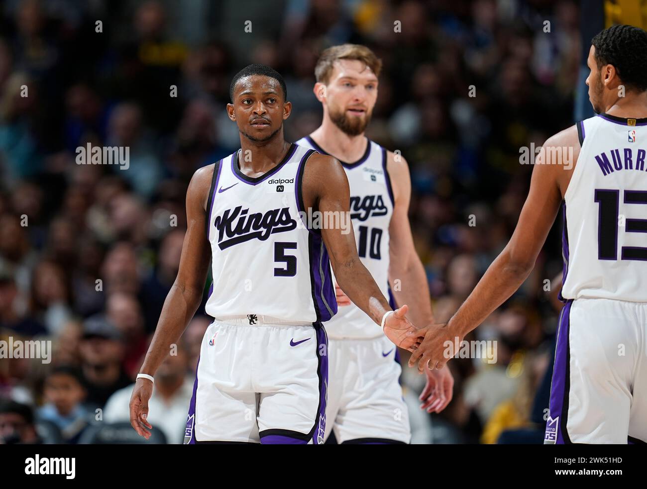 Sacramento Kings guard De'Aaron Fox (5), Sacramento Kings forward Domantas Sabonis (10) and ...