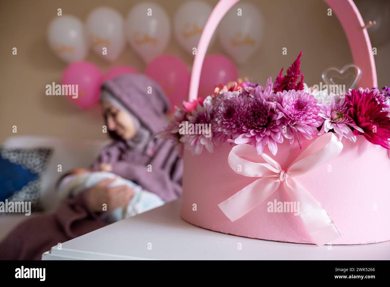 muslim arabic female celebrating with her newborn her birthday in ...