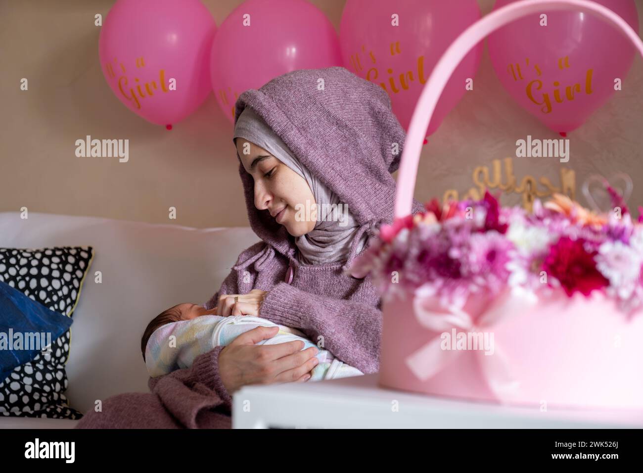 muslim arabic female celebrating with her newborn her birthday in ...