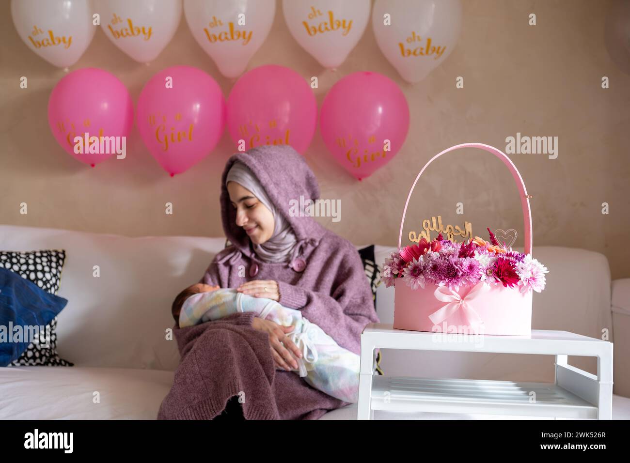 muslim arabic female celebrating with her newborn her birthday in ...