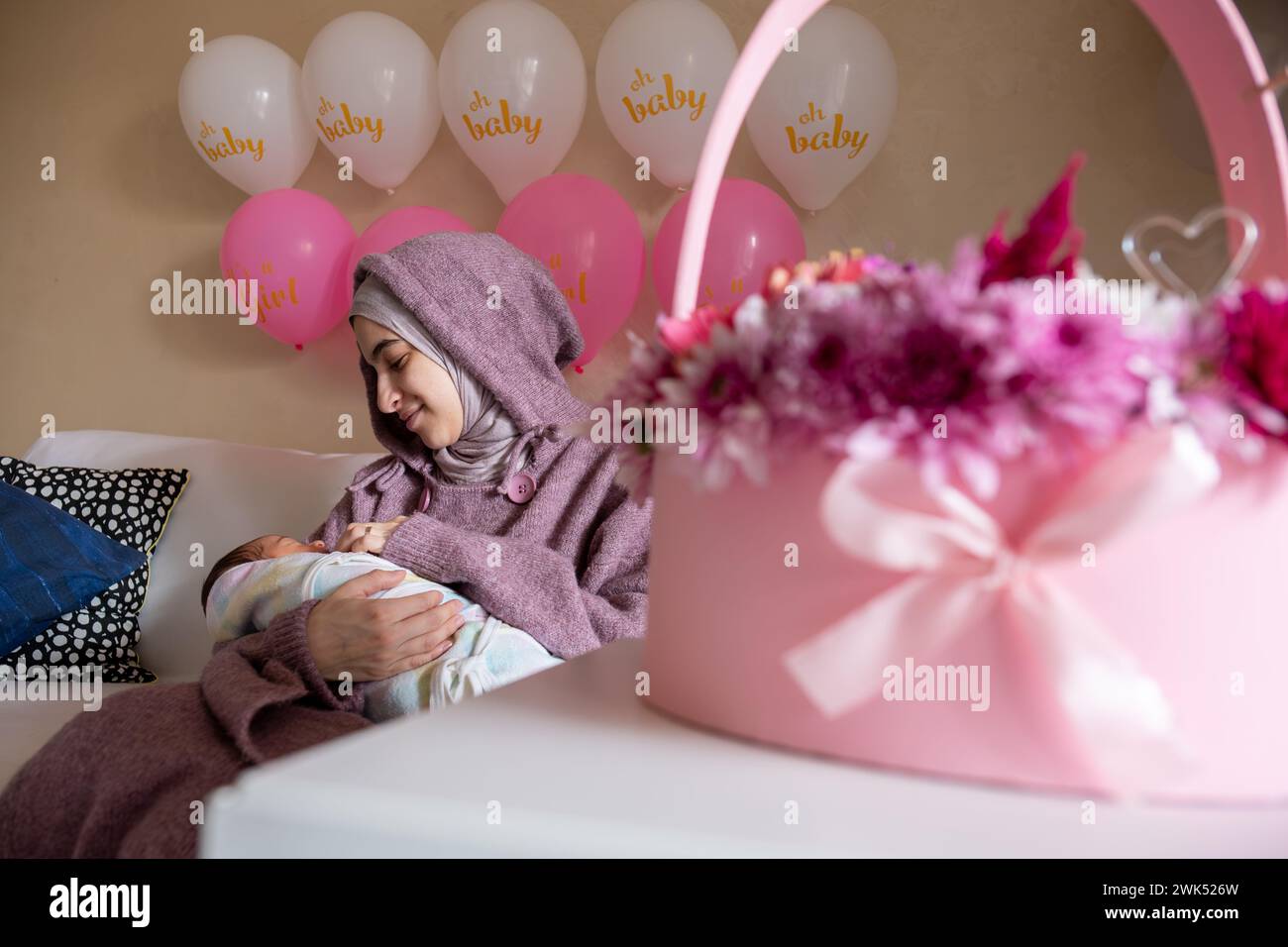 muslim arabic female celebrating with her newborn her birthday in ...