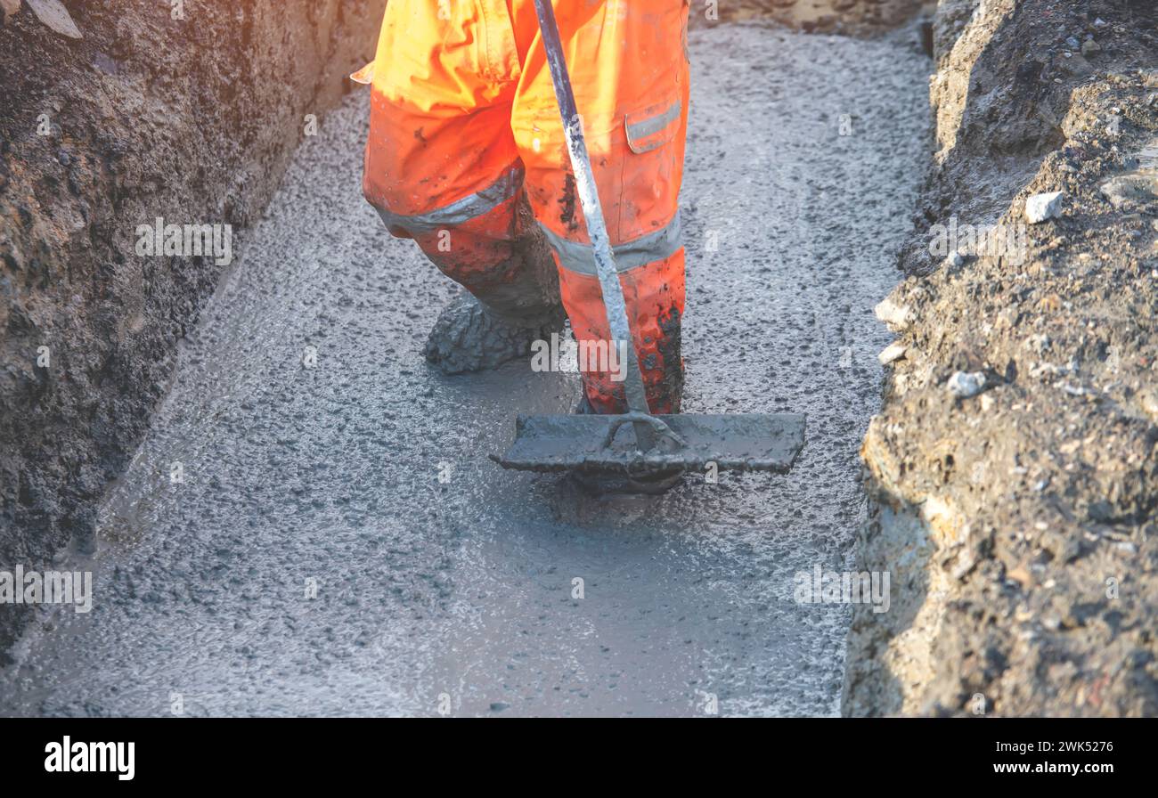 Concrete cast-in-place work. Builder level wet concrete. Concrete works ...