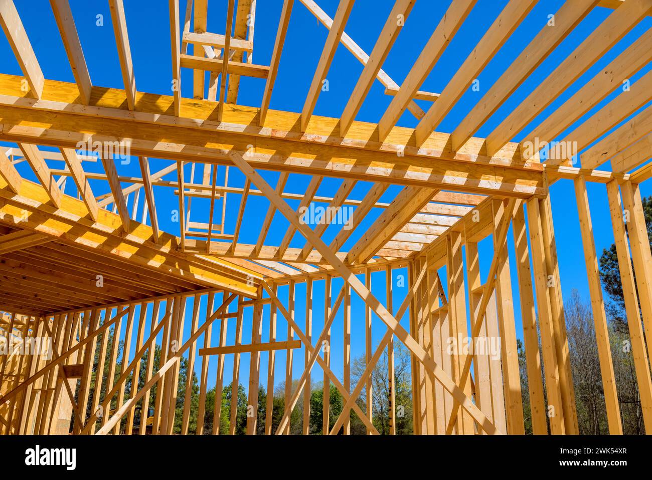 Timber wood stick frame framing beams in construction of new house ...