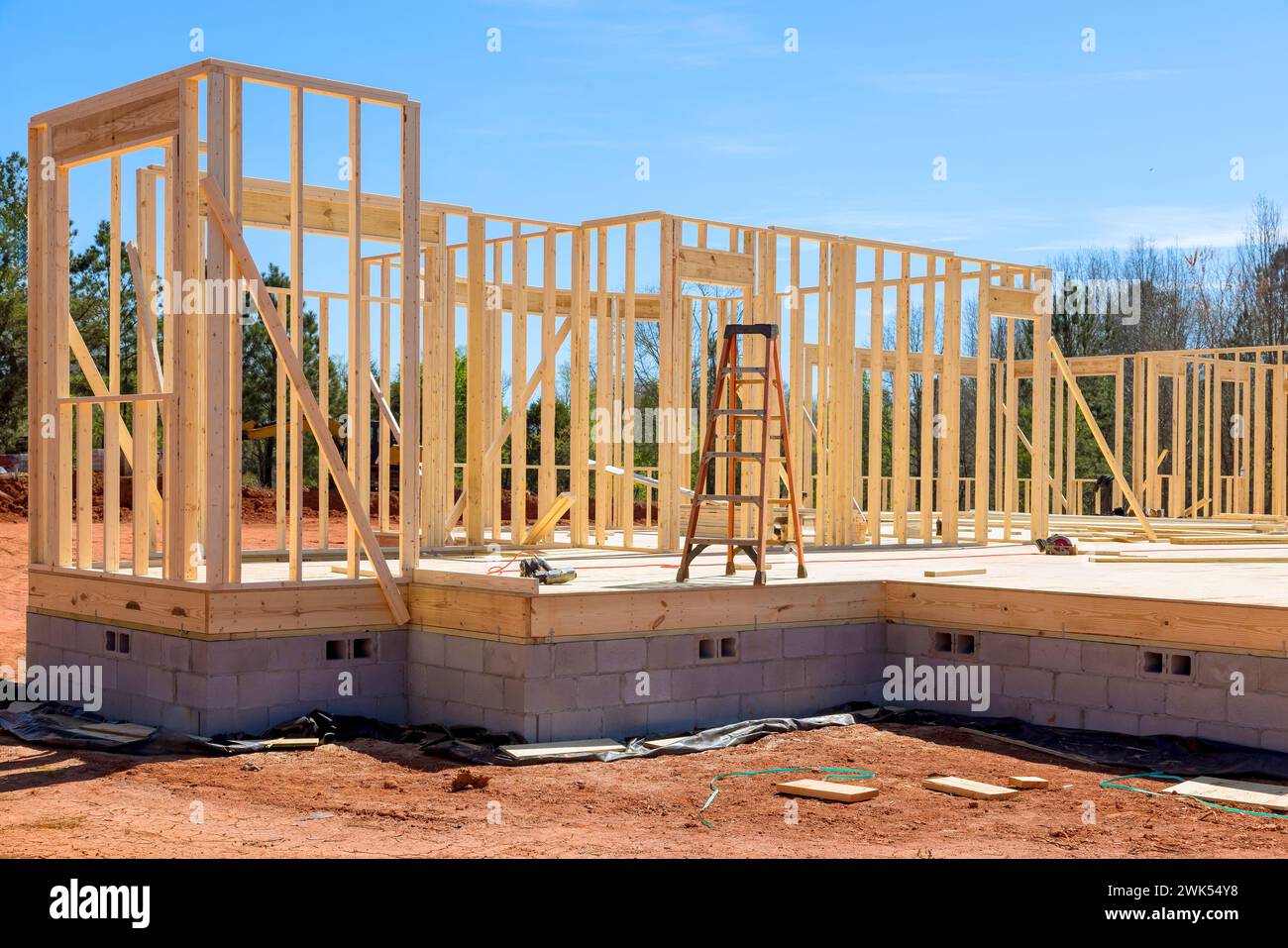 During construction of new house, wood stick frame is used to frame ...