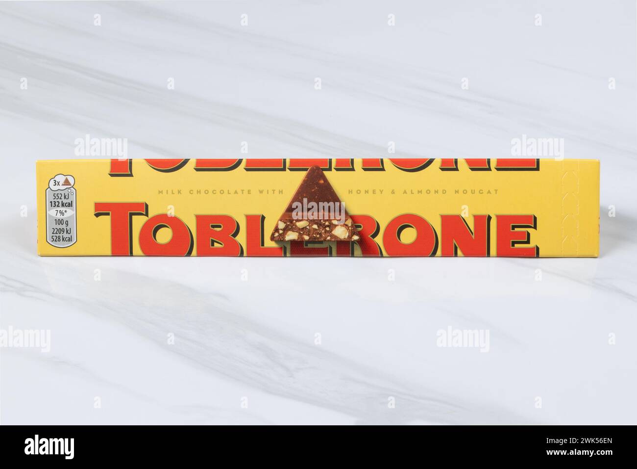 packet of Toblerone brand honey and almond chocolate, close-up ...