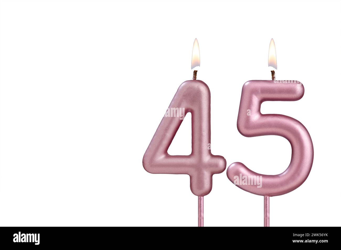 Candle number 45 - Lit birthday candle on white background Stock Photo ...