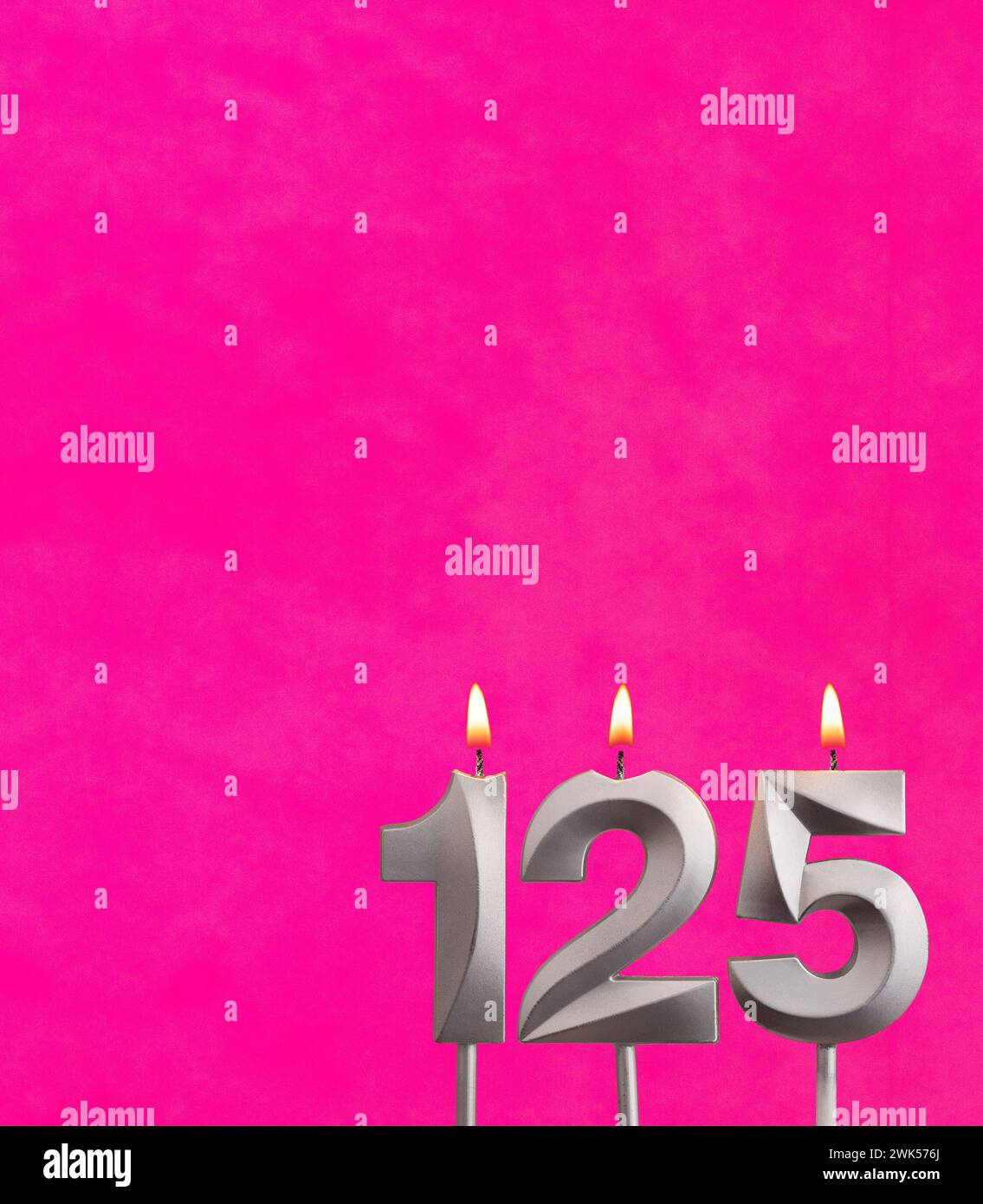 Candle number 125 - Birthday celebration on fuchsia background Stock ...