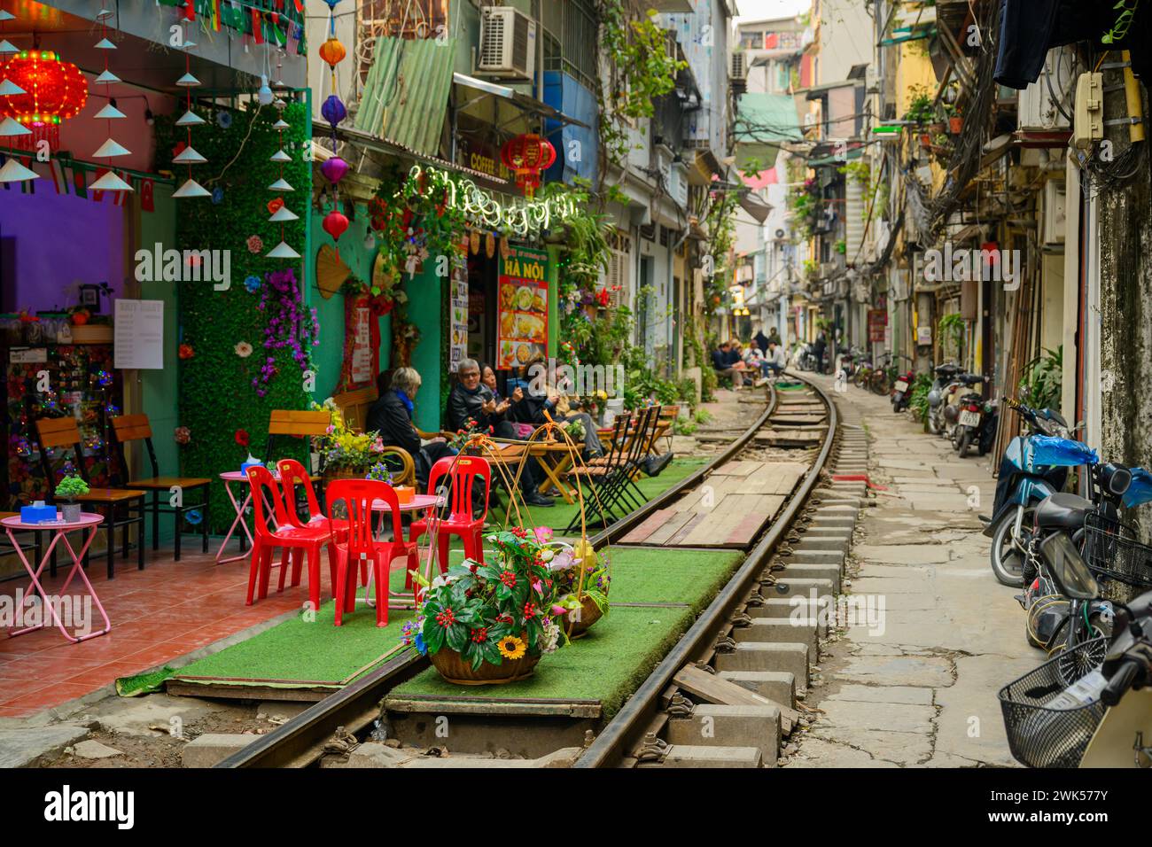 Waiting for a train on Hanoi Train Street, Hanoi, Vietnam Stock Photo ...