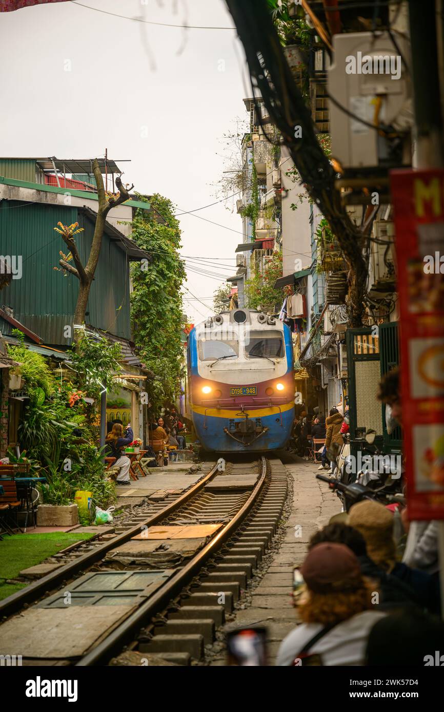 An approaching Vietnamese railway train on Train Street, Hanoi, Vietnam ...