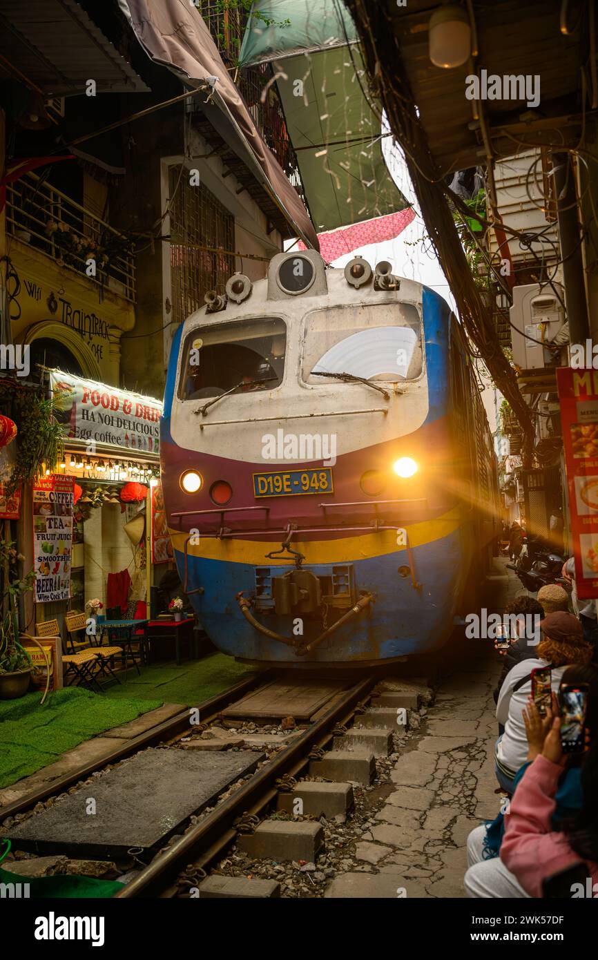 An approaching Vietnamese railway train on Train Street, Hanoi, Vietnam ...