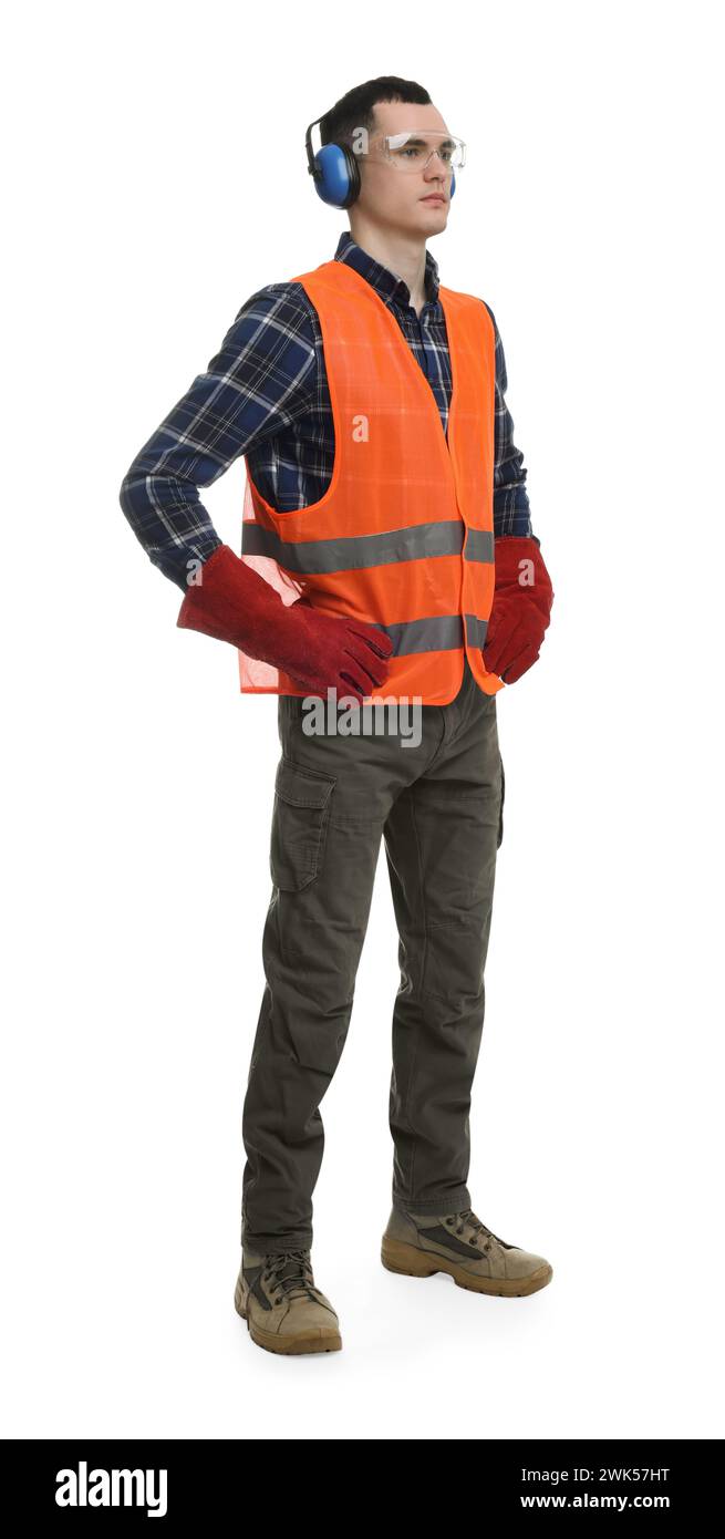 Young man wearing safety equipment on white background Stock Photo - Alamy